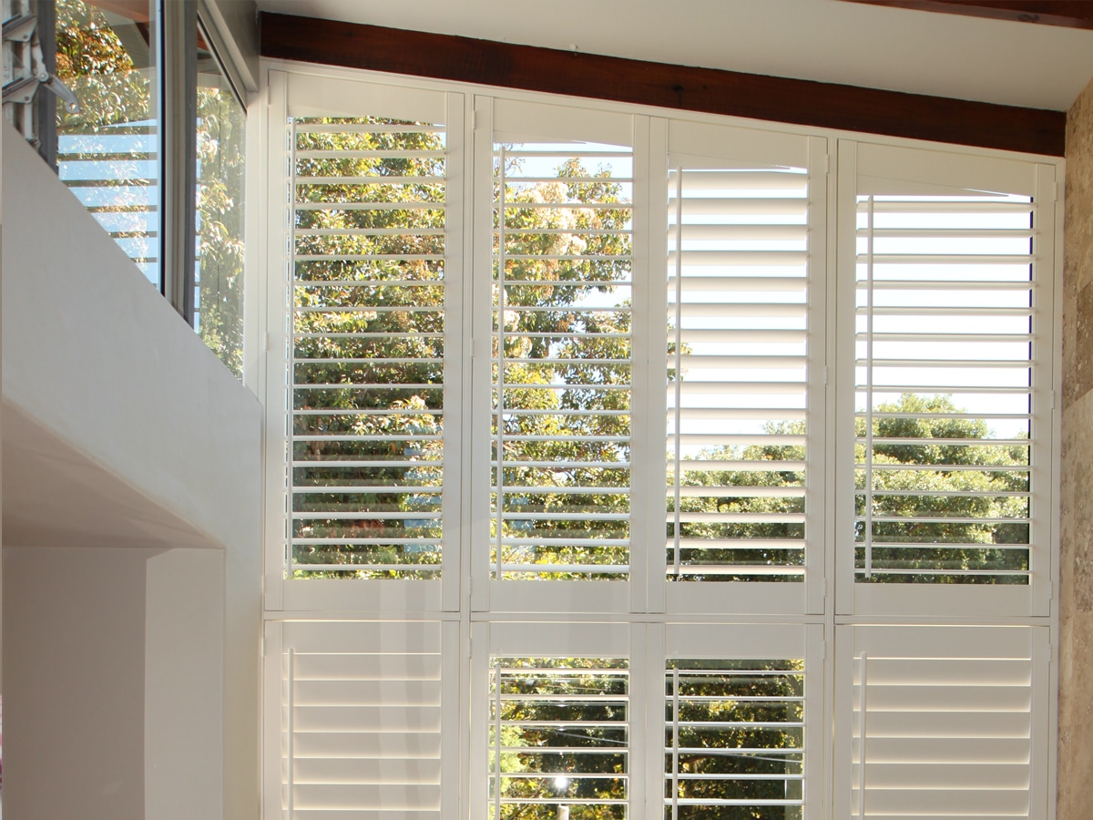 Angled Window Treatments: Shades & Shutters | Norman Canada