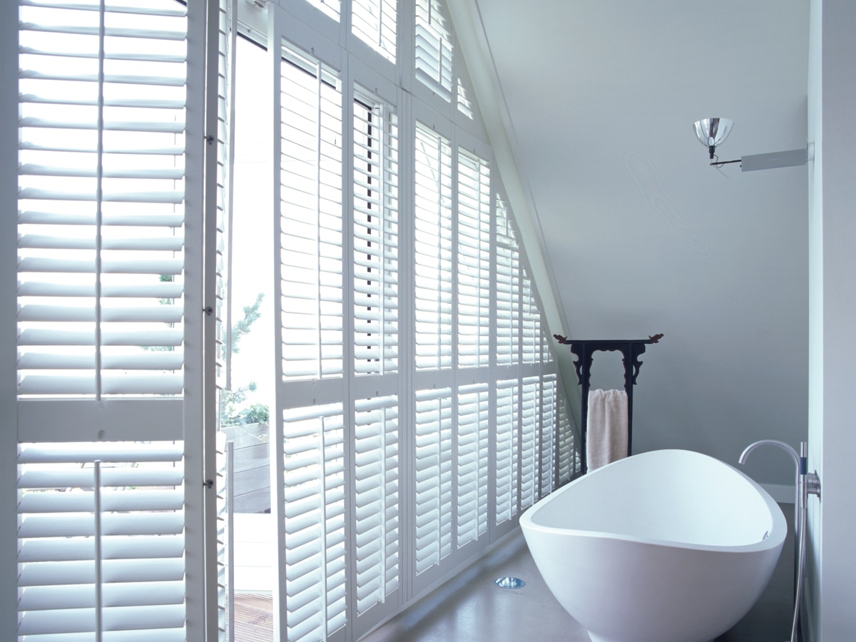 Angled Window Treatments: Shades & Shutters | Norman Canada